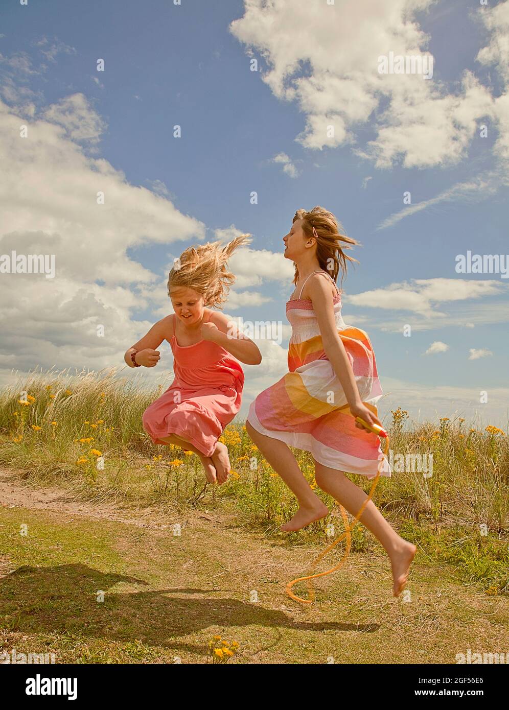 Children girls skipping rope hi-res stock photography and images - Alamy