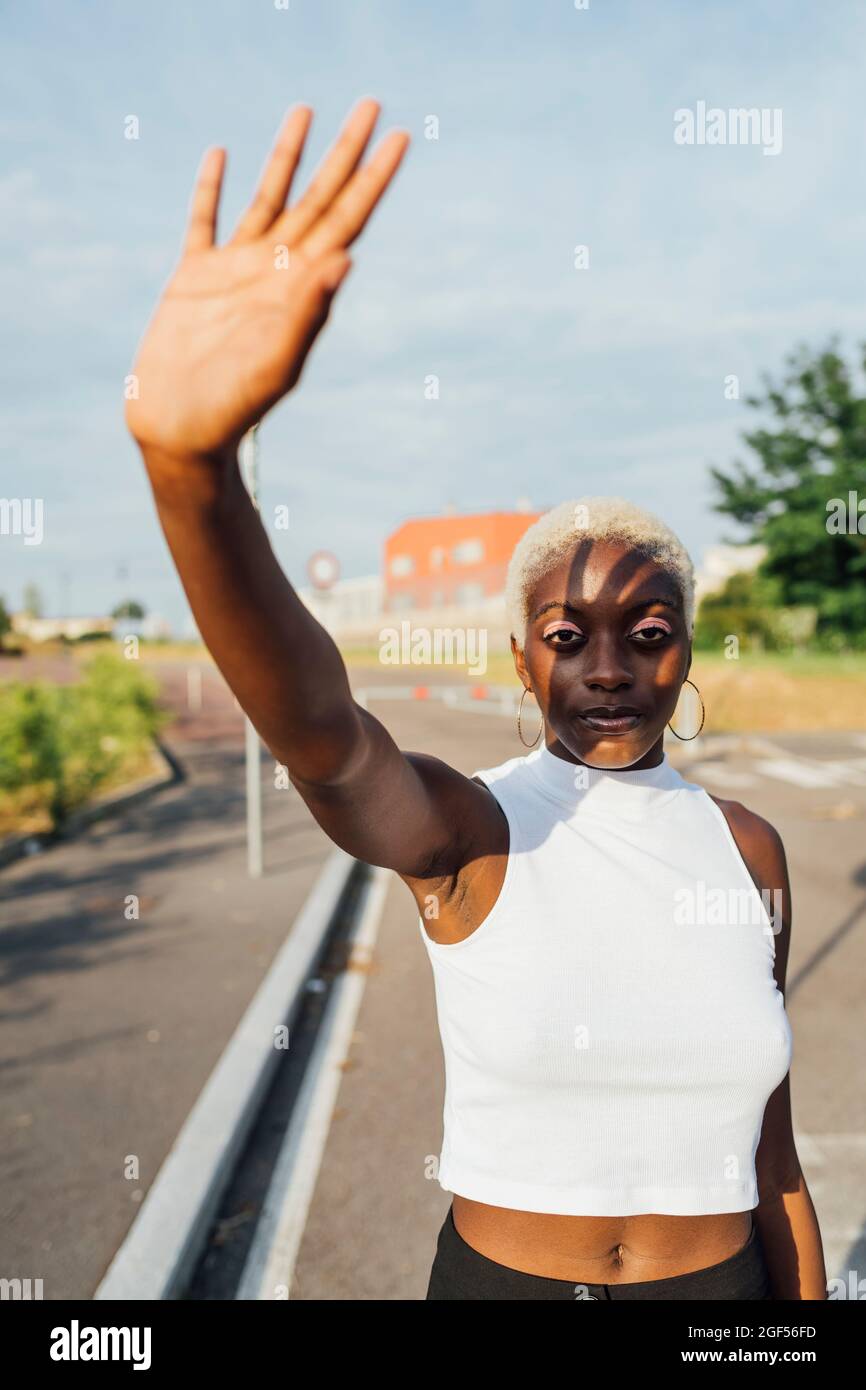 Woman waving hand hi-res stock photography and images - Alamy
