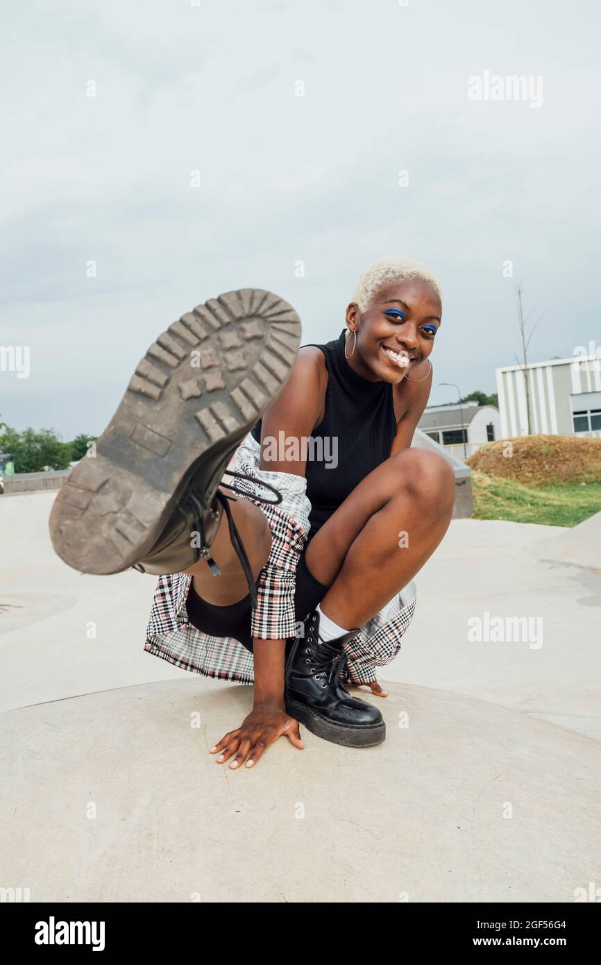 Woman kicking leg hi-res stock photography and images - Alamy