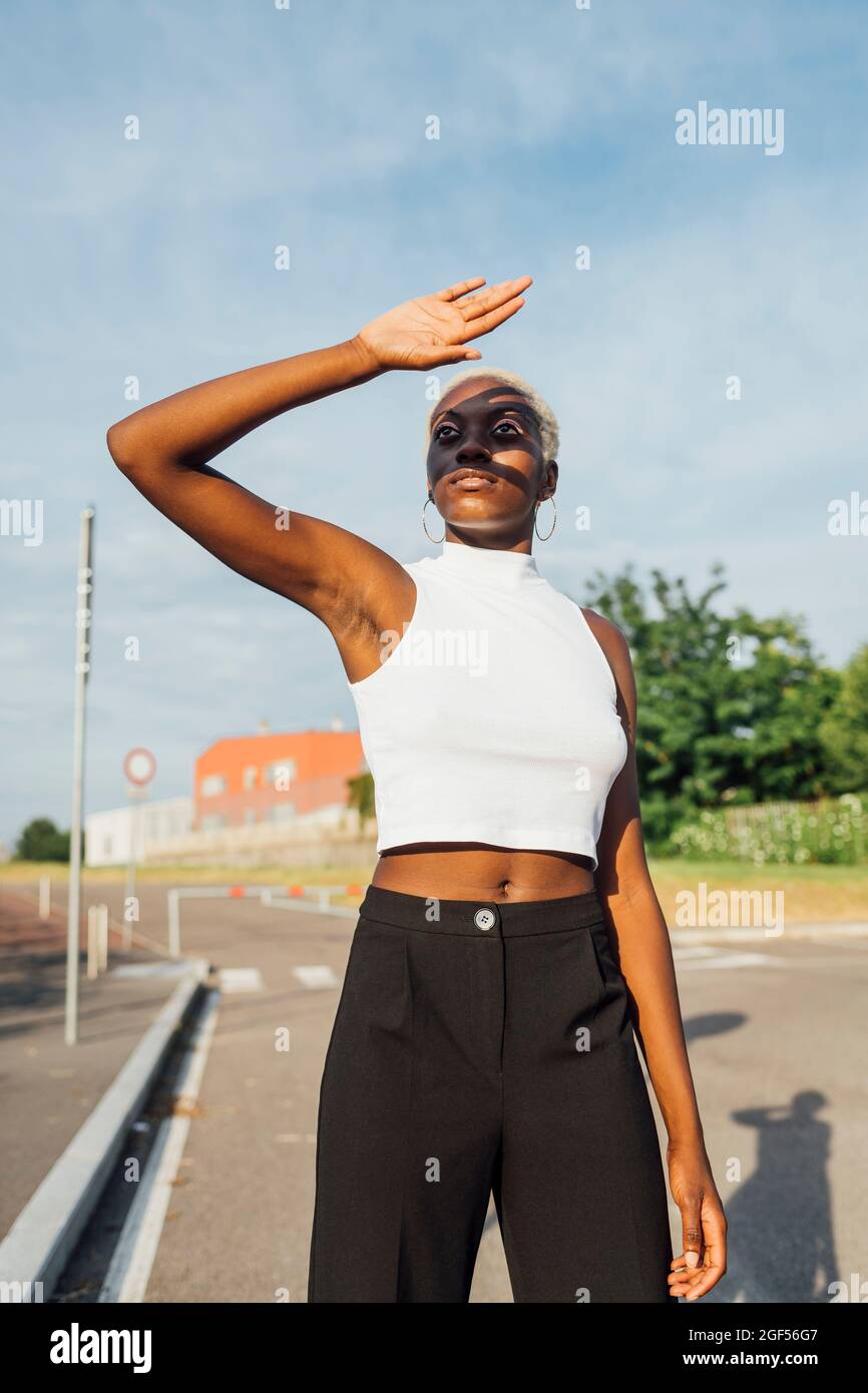 Woman shielding her face hi-res stock photography and images - Alamy
