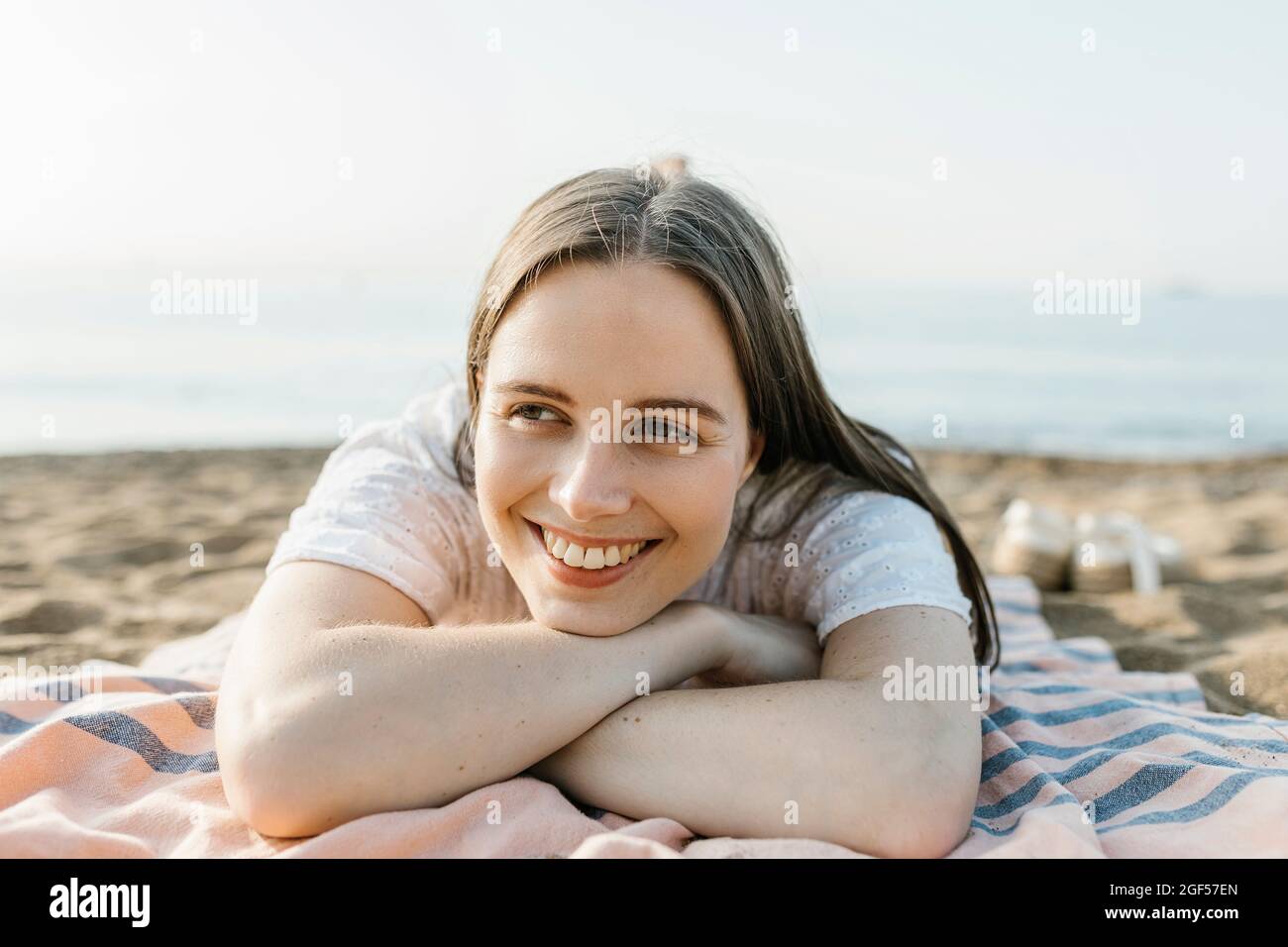 Woman relaxing on the beach spain hi-res stock photography and images ...