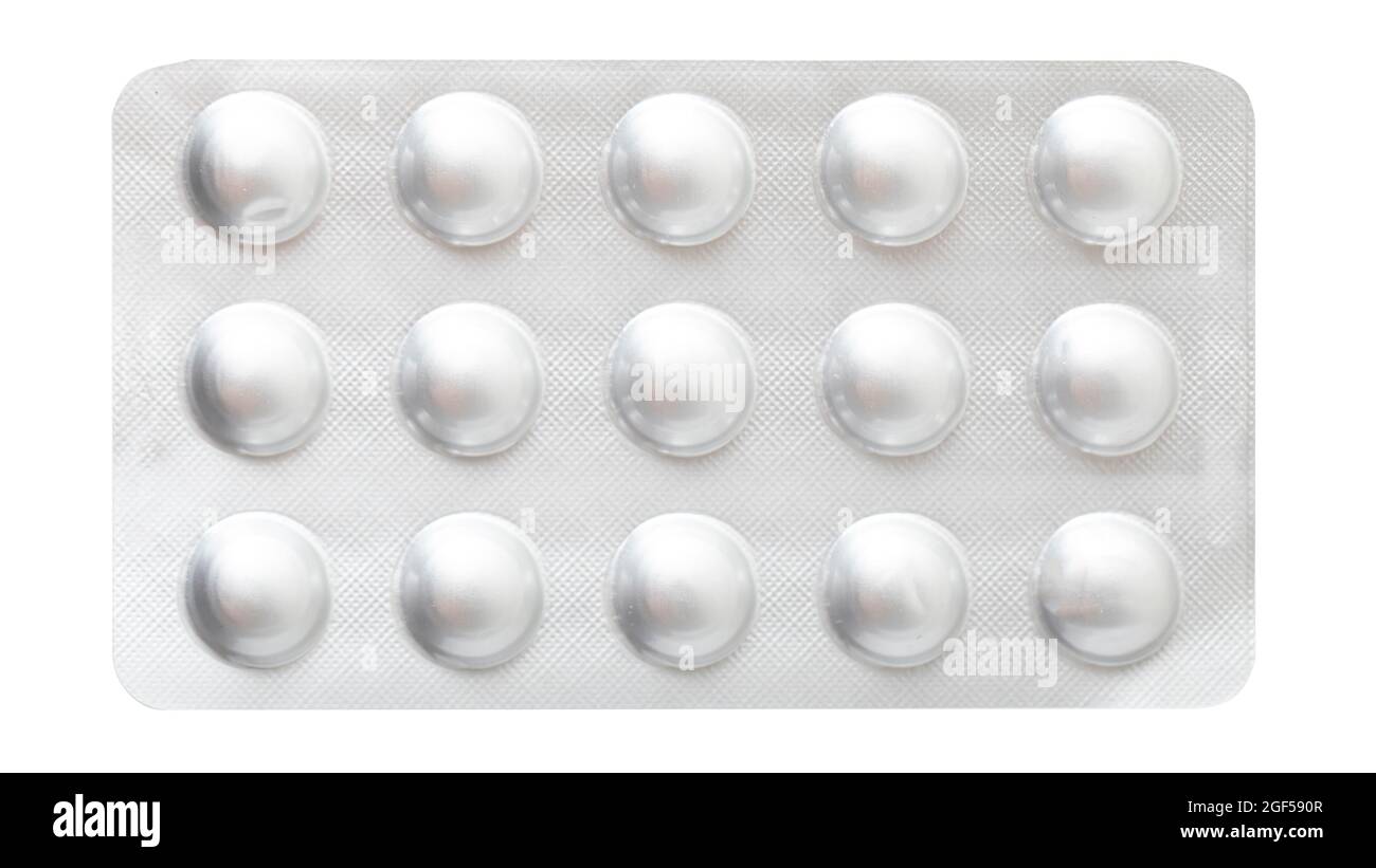 Medical drug, silver opaque plate with pills isolated on a white ...