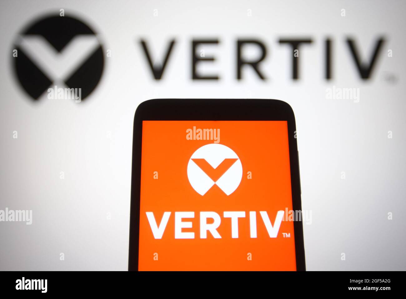 In this photo illustration, Vertiv Holdings Co logo is seen displayed ...