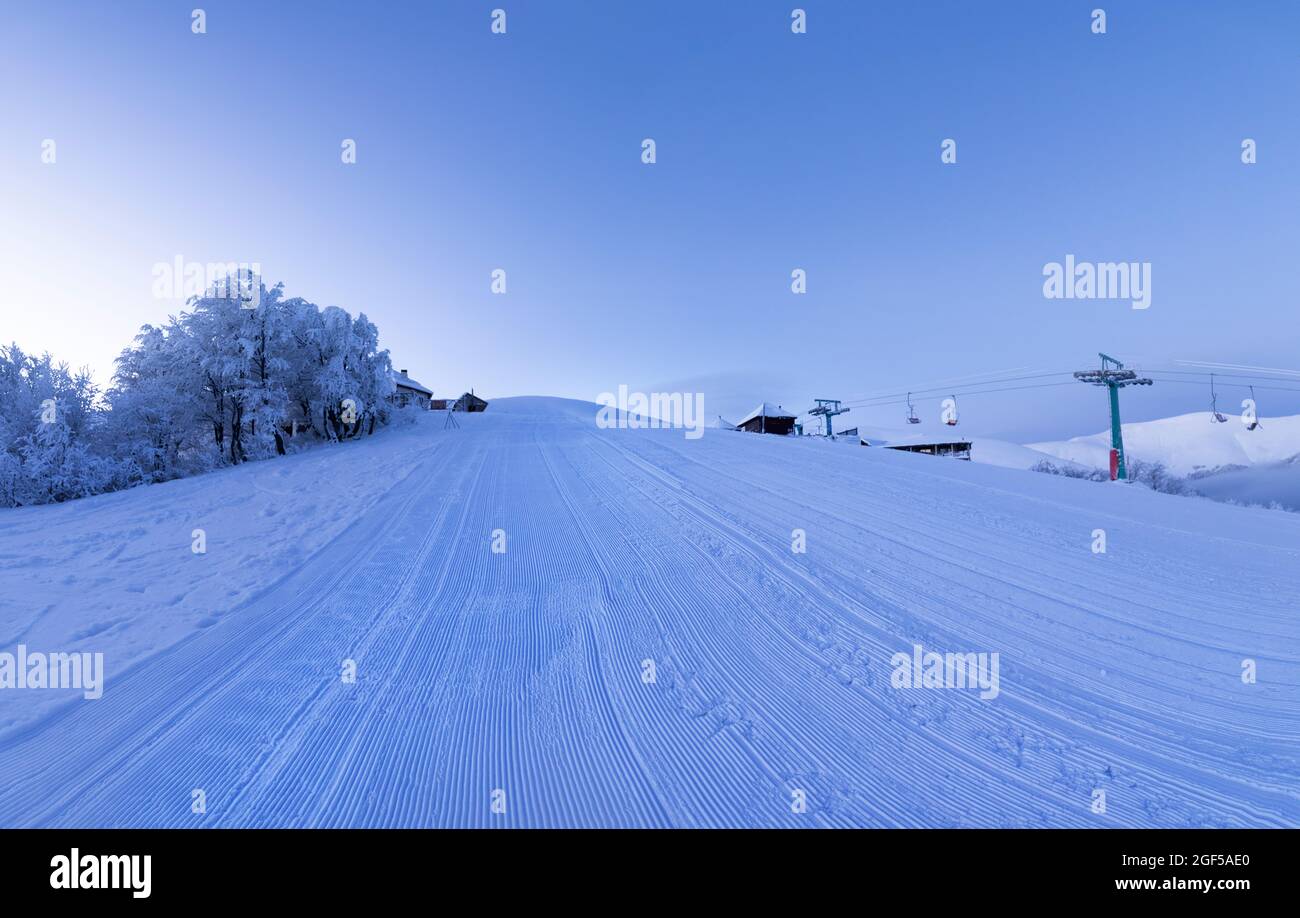 Alps ski slope dawn hi-res stock photography and images - Alamy