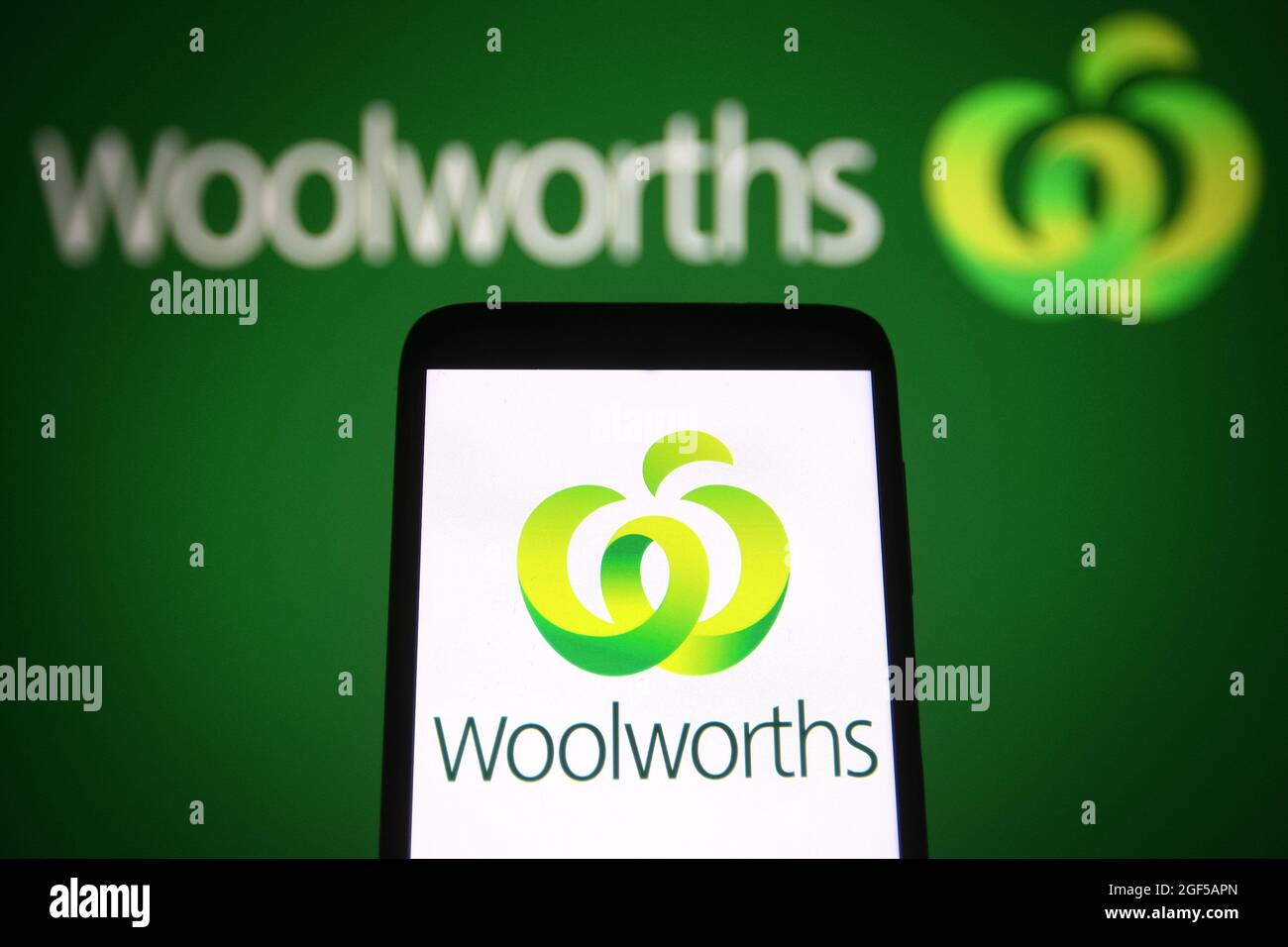 In this photo illustration, Woolworths logo is seen displayed on a ...