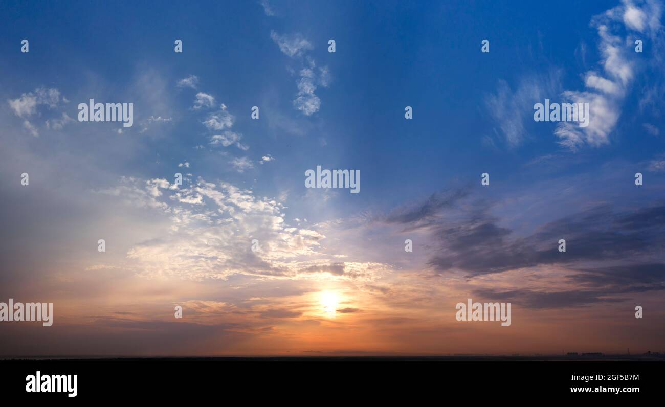 Dawn or evening sky sunset, clouds and blue sky. Wonderful landscape ...