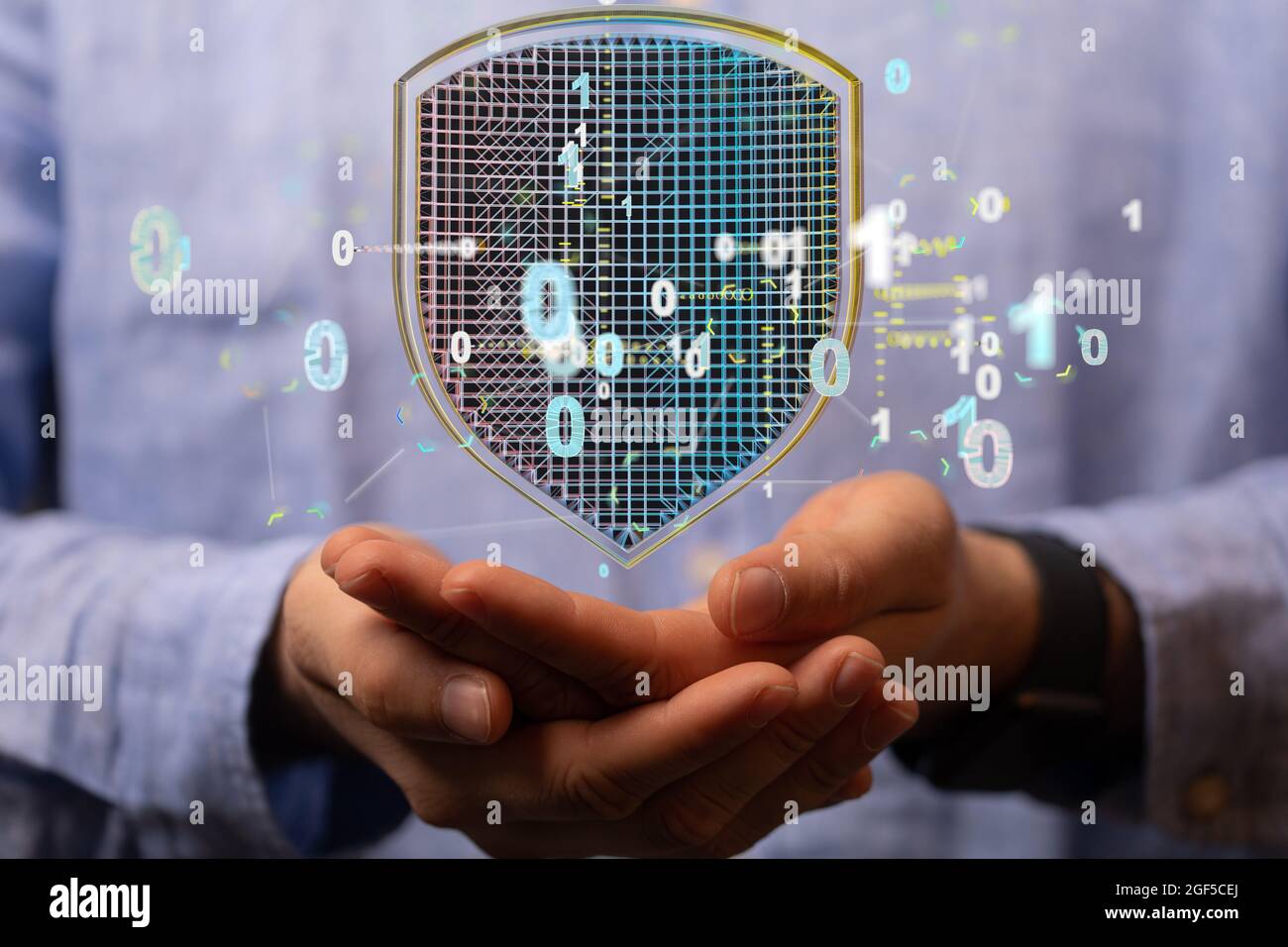 Man Holding A 3d Shield Icon Symbolizing Data Security And Protection