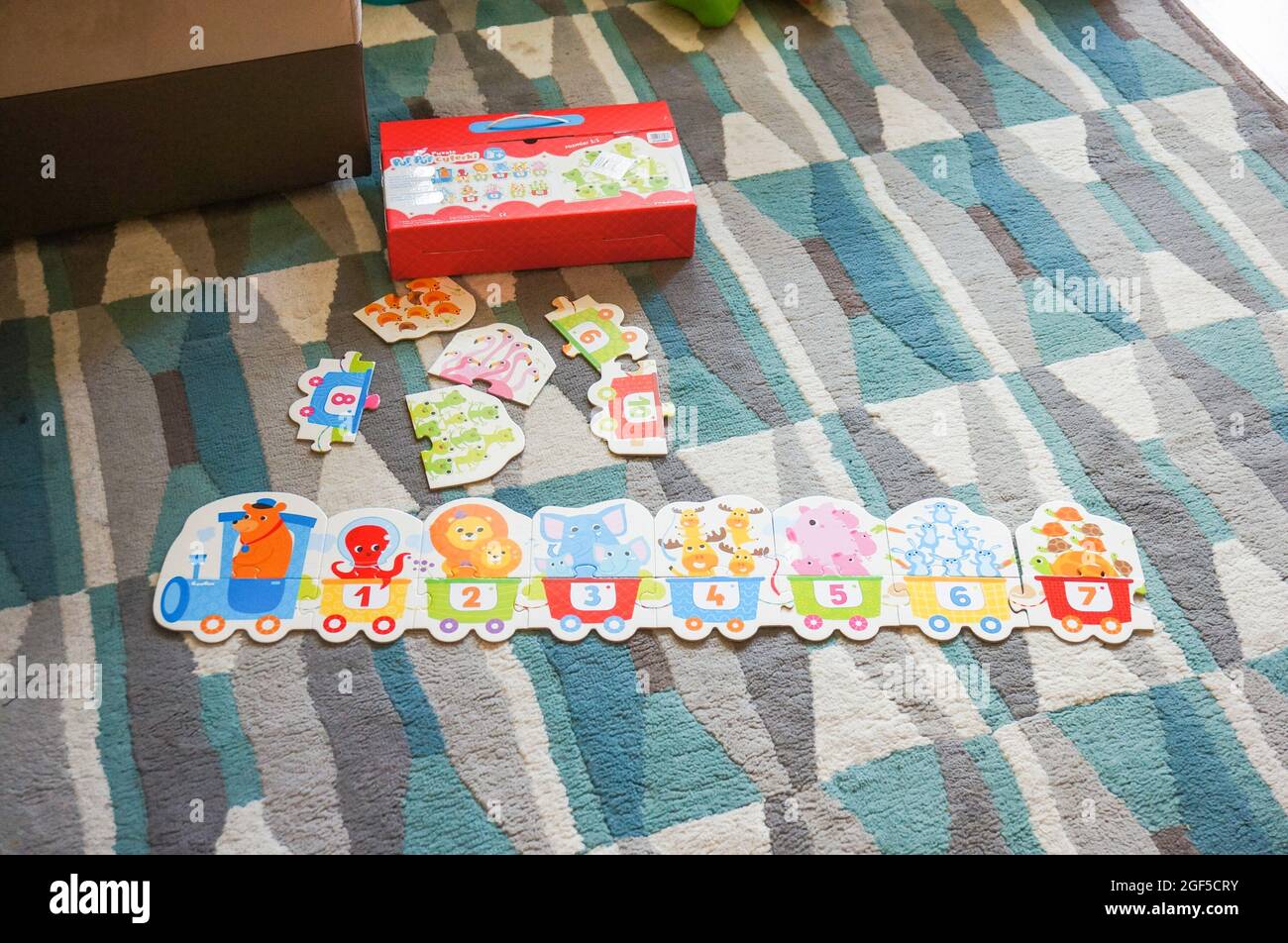 POZNAN, POLAND - Jun 11, 2016: A colorful train puzzle with numbers and ...
