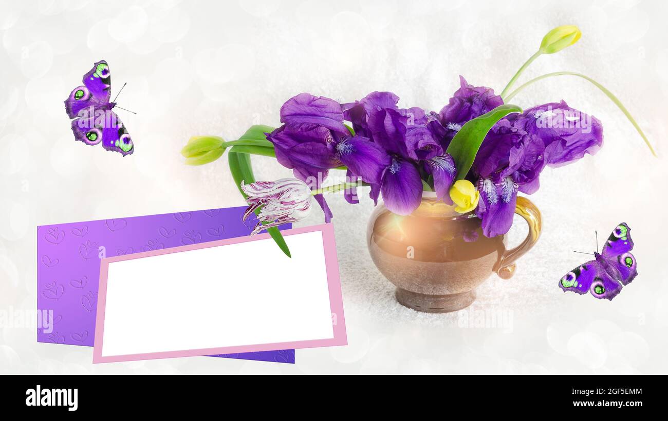 Light background with a bouquet of purple flowers and a place in a text ...