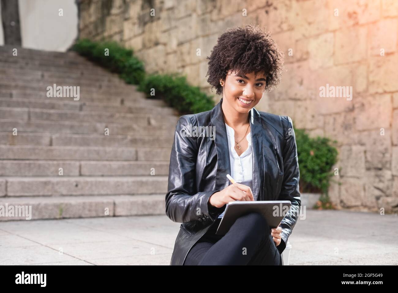 Latin business woman drinking coffee. Smiling businesswoman networking ...