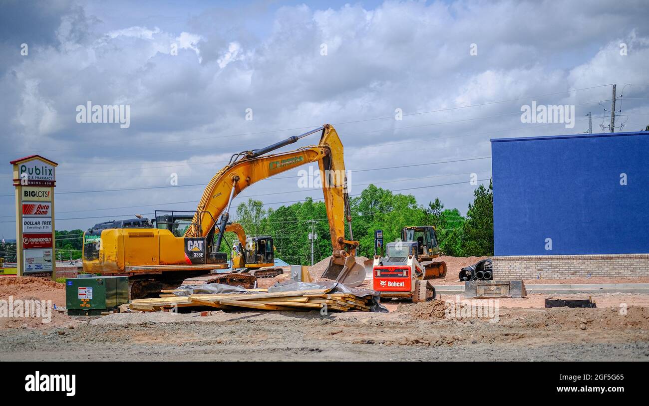 Cat Loader at Commercial Construction Site Stock Photo - Alamy