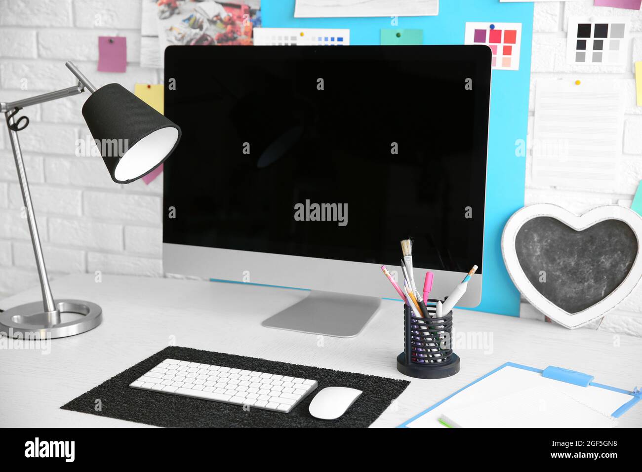 Stylish bright workplace of vivid person Stock Photo - Alamy