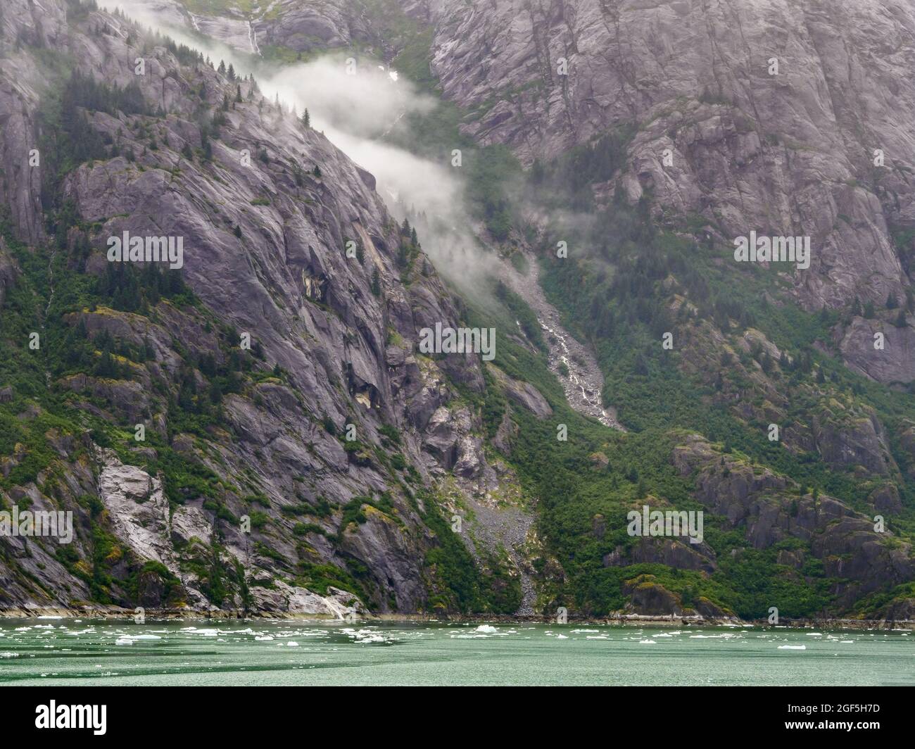 Steep cliffs carved by glaciers, Endicott Arm, Dawes Glacier, Alaska ...
