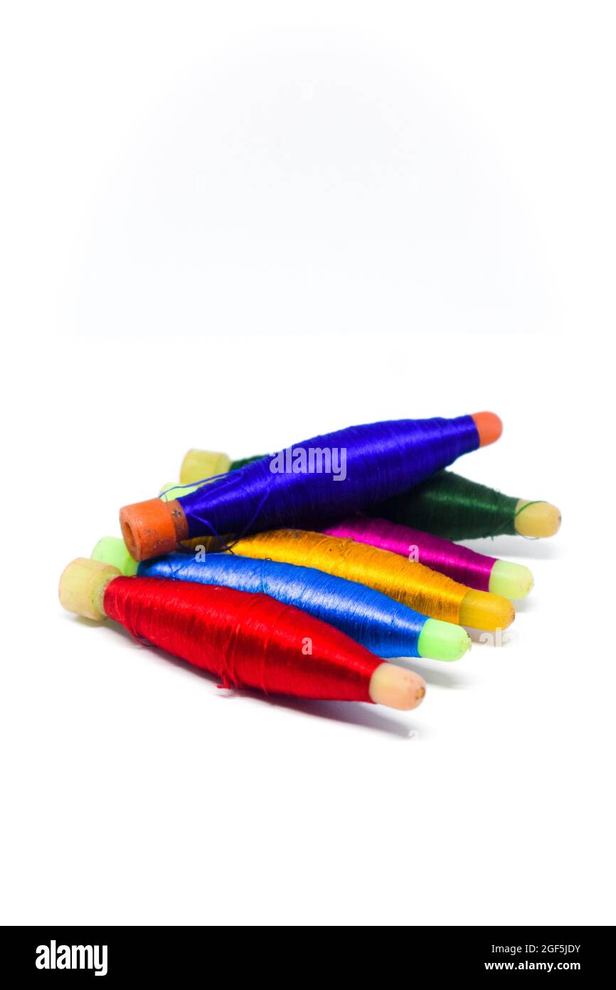 Bunch of rolls of colorful string isolated on a white background Stock ...