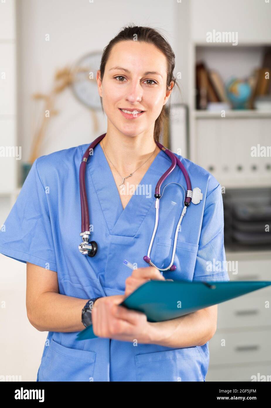 Woman doctor wear white medical uniform and stethoscope with blue ...
