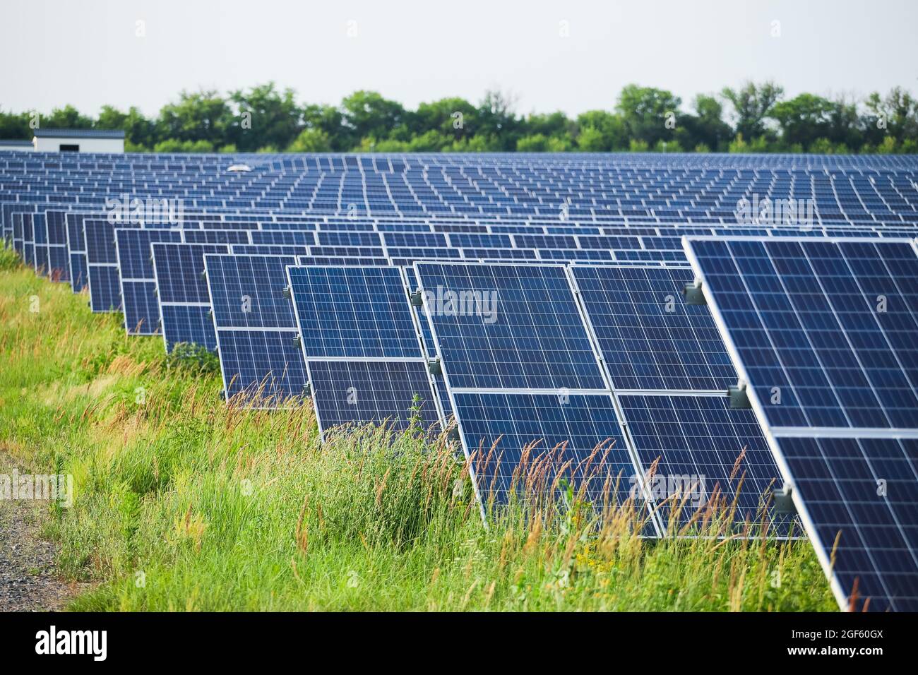 Solar cell station in the field. Natural energy Stock Photo - Alamy