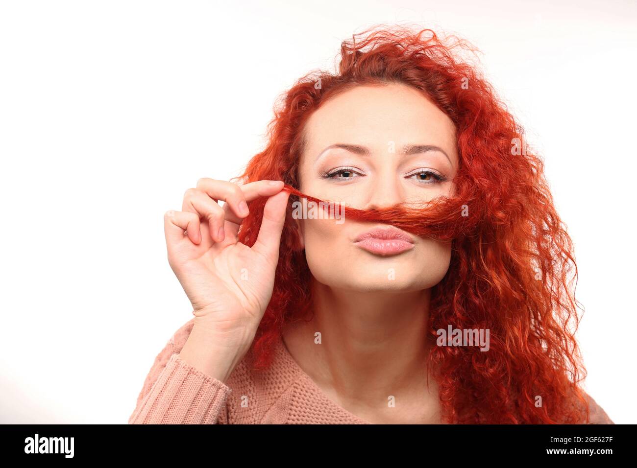 Funny red-haired young woman, isolated on white Stock Photo - Alamy