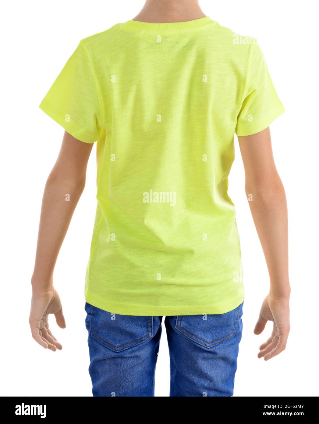 Clothes advertising. Boy in yellow T-shirt and jeans isolated on white ...
