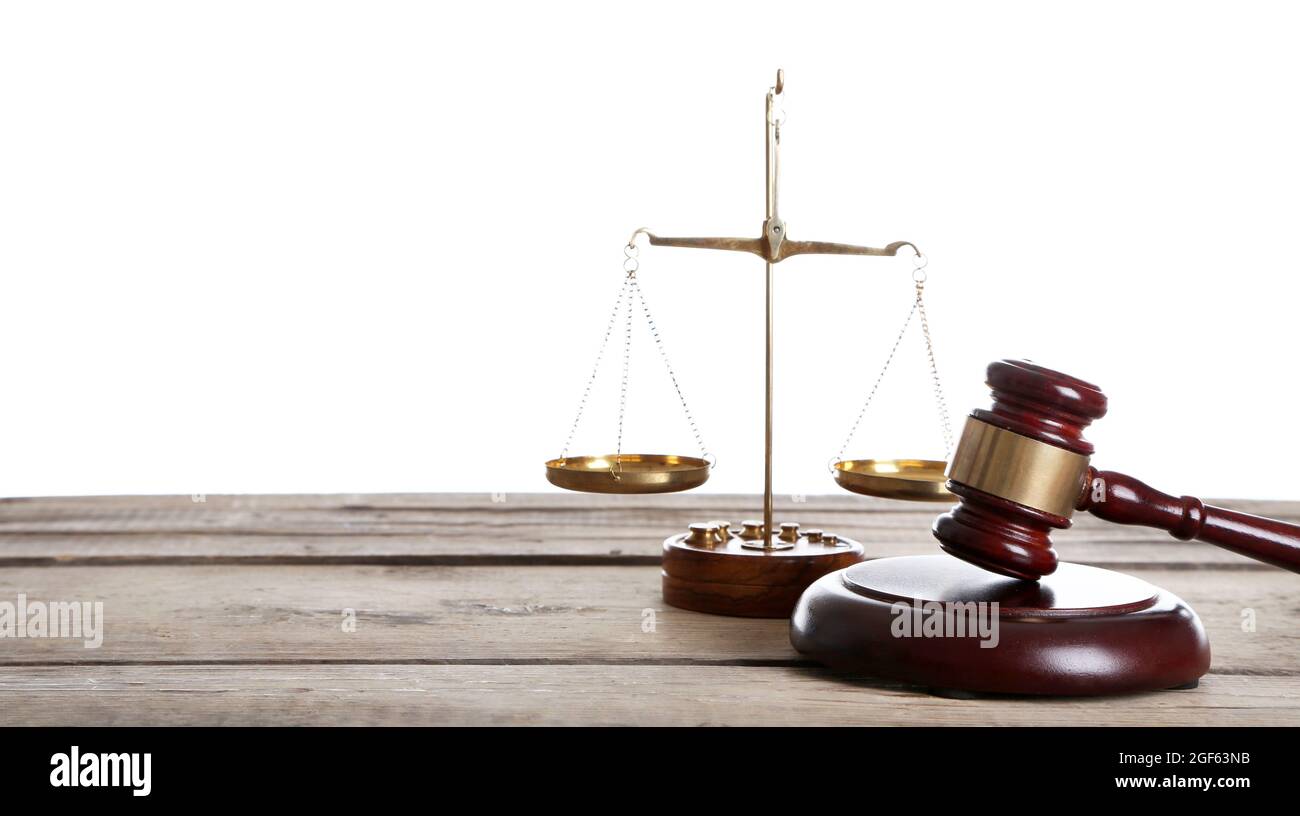 Wooden gavel with justice scales on white background Stock Photo - Alamy