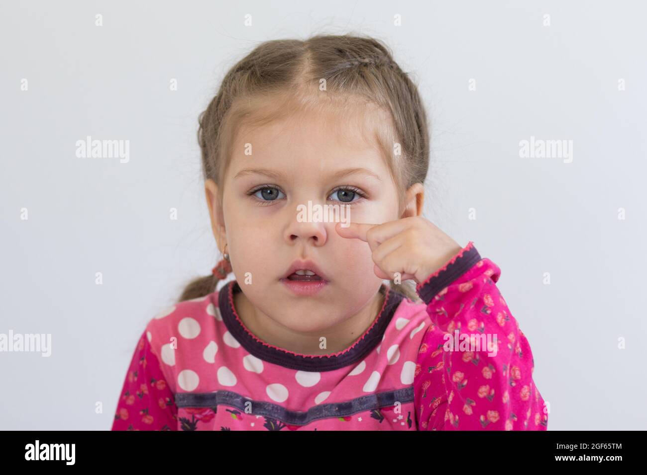 Portrait of caucasian child of three years old with serious face ...