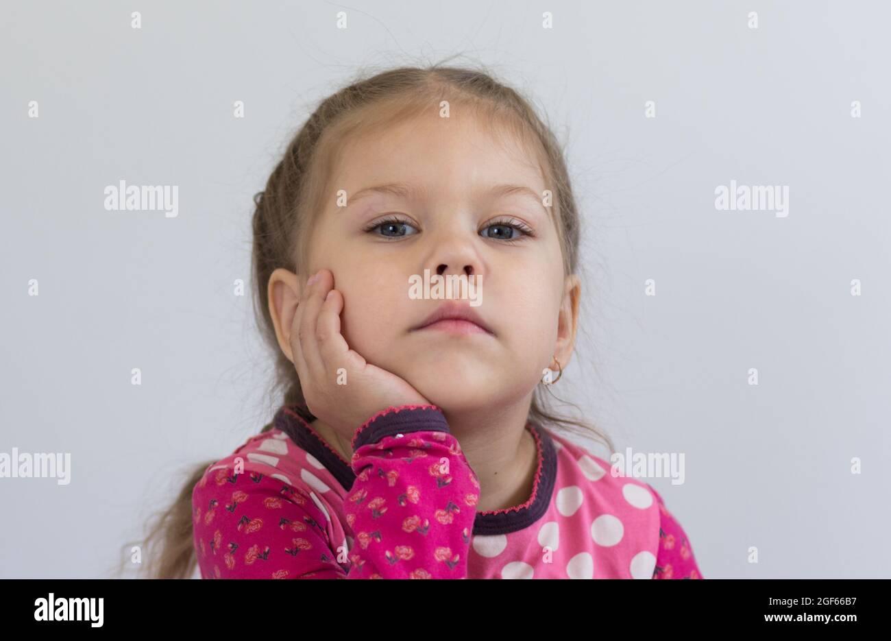 Holding his chin hi-res stock photography and images - Alamy