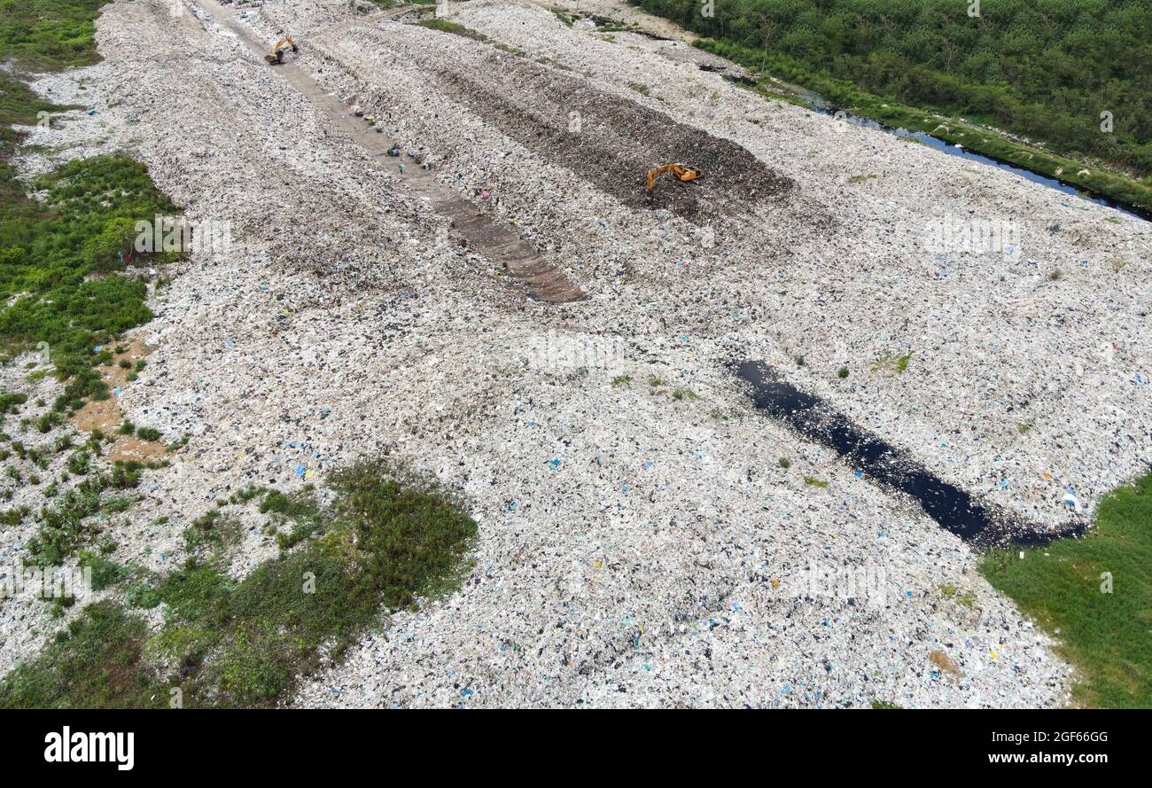 Aerial view landfill garbage waste huge dump environmental pollution ...