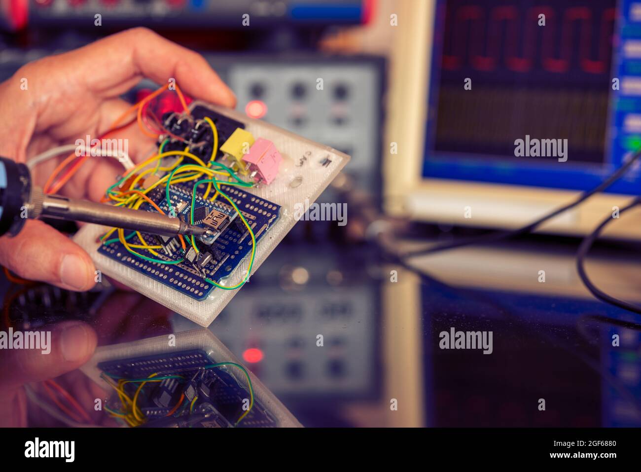 Manufacturing and setting up an electronic device in the laboratory ...