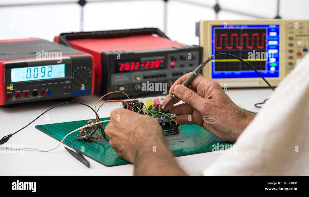 Computer motherboard repair in customer service laboratory workshop ...