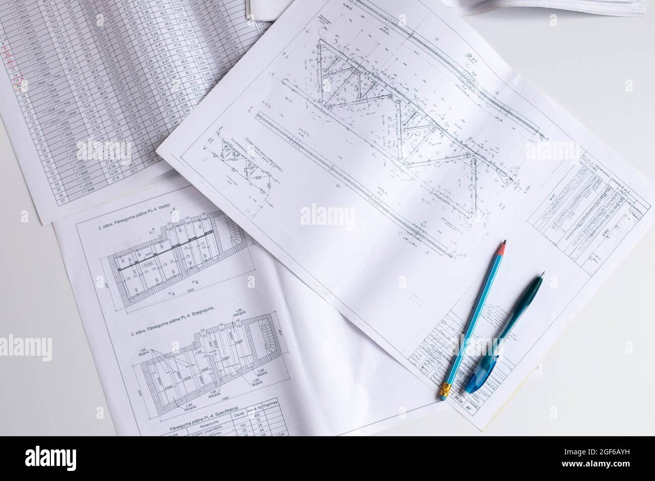 drawings of a construction engineer on a sheet of paper Stock Photo - Alamy