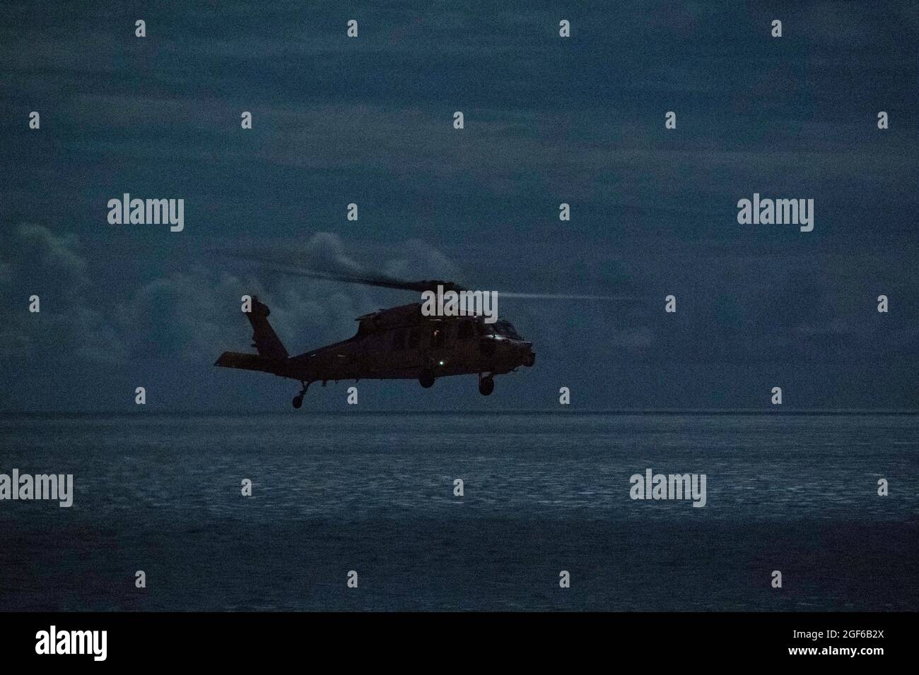 210823-N-MD461-1443 PACIFIC OCEAN (August 23, 2021) An MH-60S Sea Hawk ...