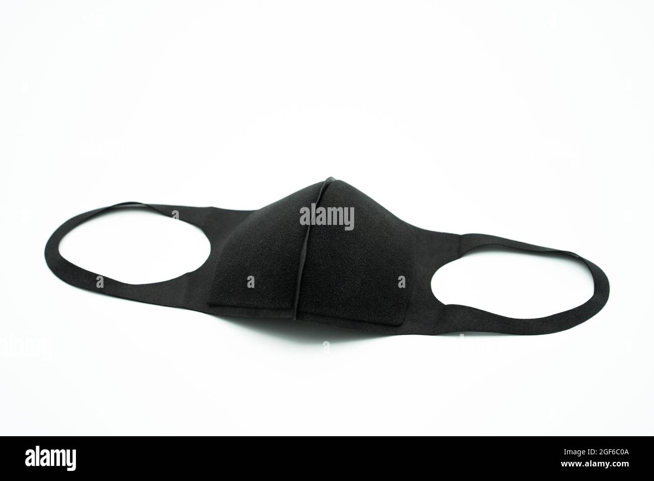 Closeup shot of a black face mask isolated on white background Stock ...