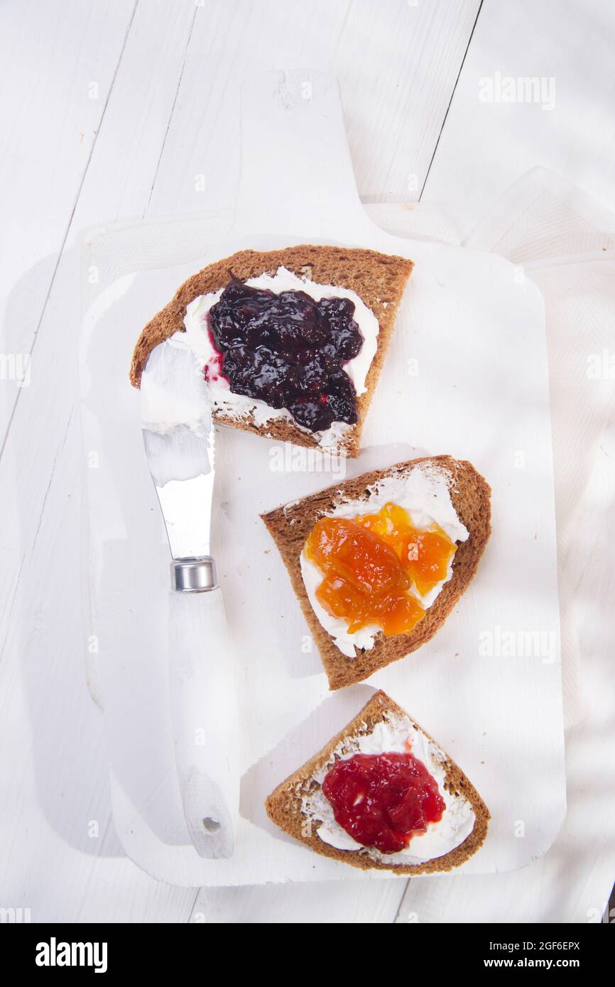 Italian breakfast made with whole wheat bread, butter and jam Stock ...