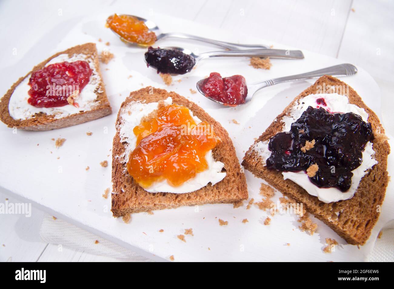Italian breakfast made with whole wheat bread, butter and jam Stock ...