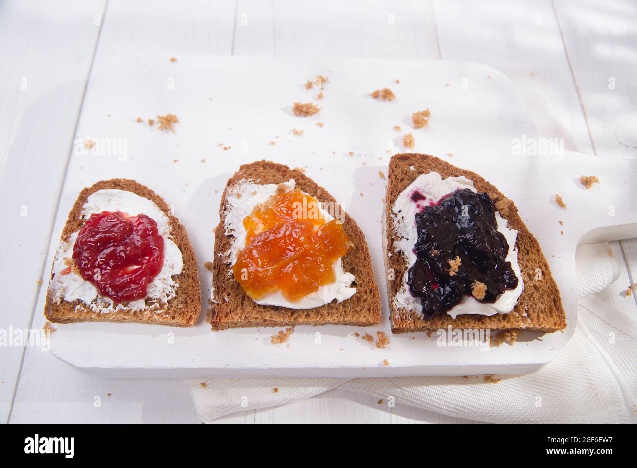 Italian breakfast made with whole wheat bread, butter and jam Stock ...
