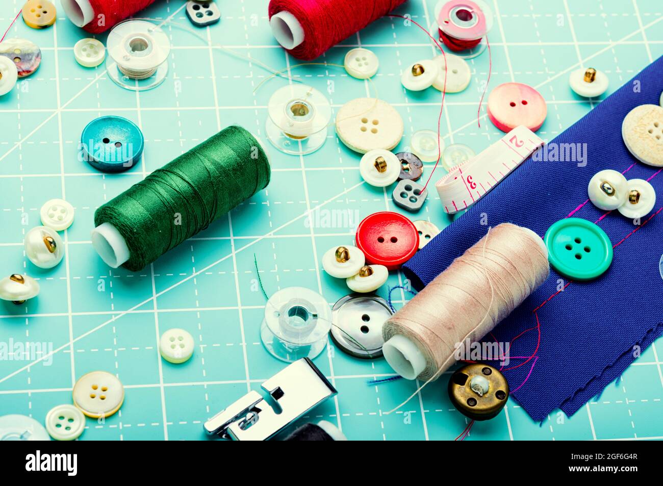 Sewing kit,thread,cloth and buttons.Sewing background,accessories for ...