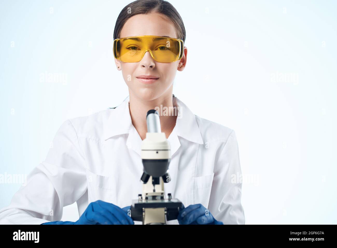 female doctor laboratory research microscope science Stock Photo - Alamy