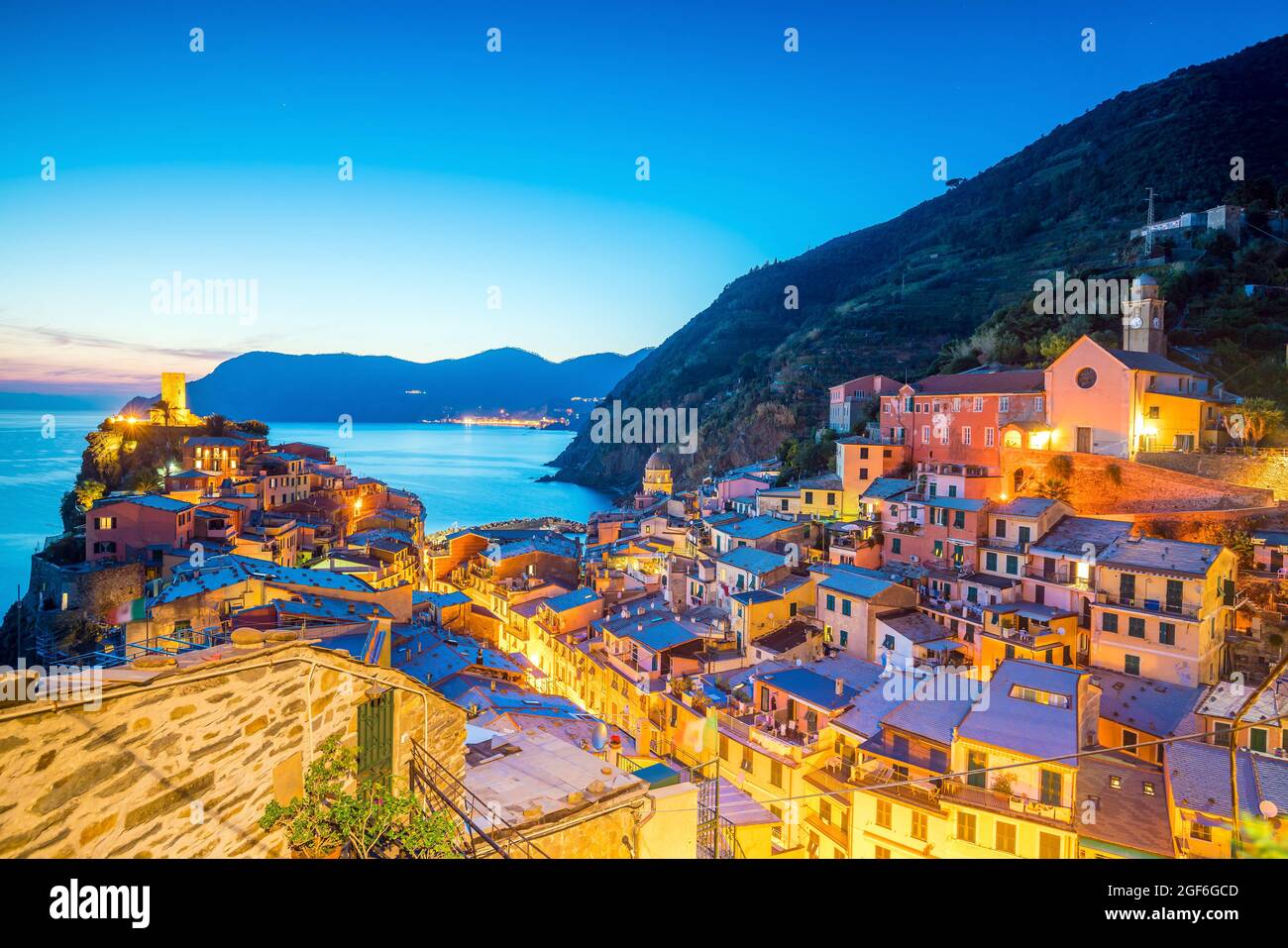 View of Vernazza at sunset. One of five famous colorful villages of ...