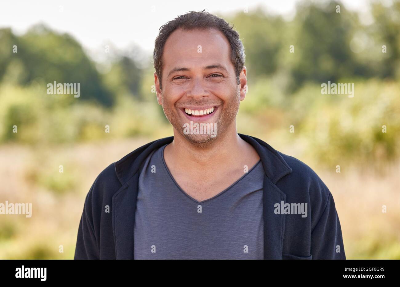 23 August 2021, Lower Saxony, Lüneburg: Daniel Hartwig, actor, smiles ...