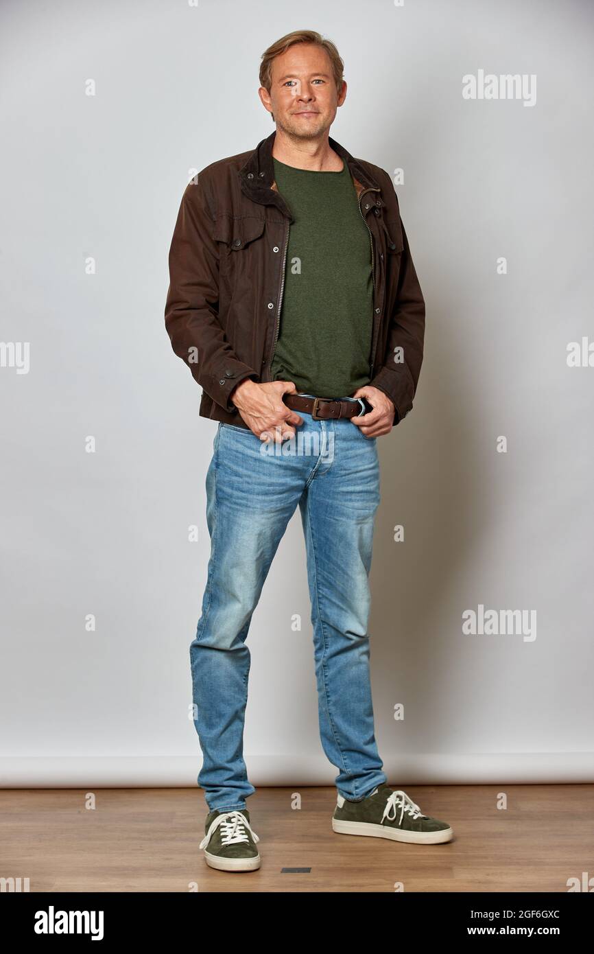 23 August 2021, Lower Saxony, Lüneburg: Oliver Clemens, actor, smiles ...