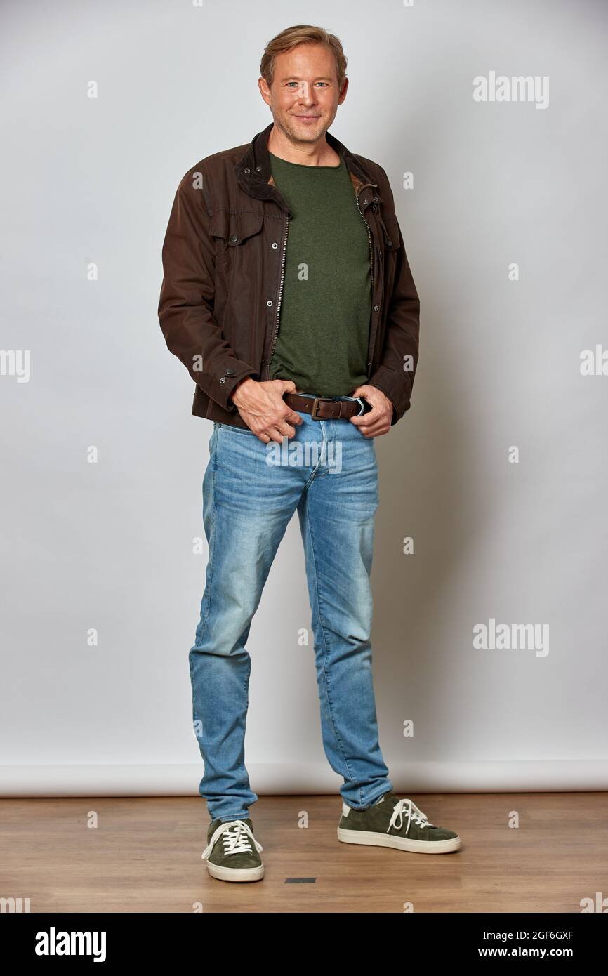 23 August 2021, Lower Saxony, Lüneburg: Oliver Clemens, actor, smiles ...