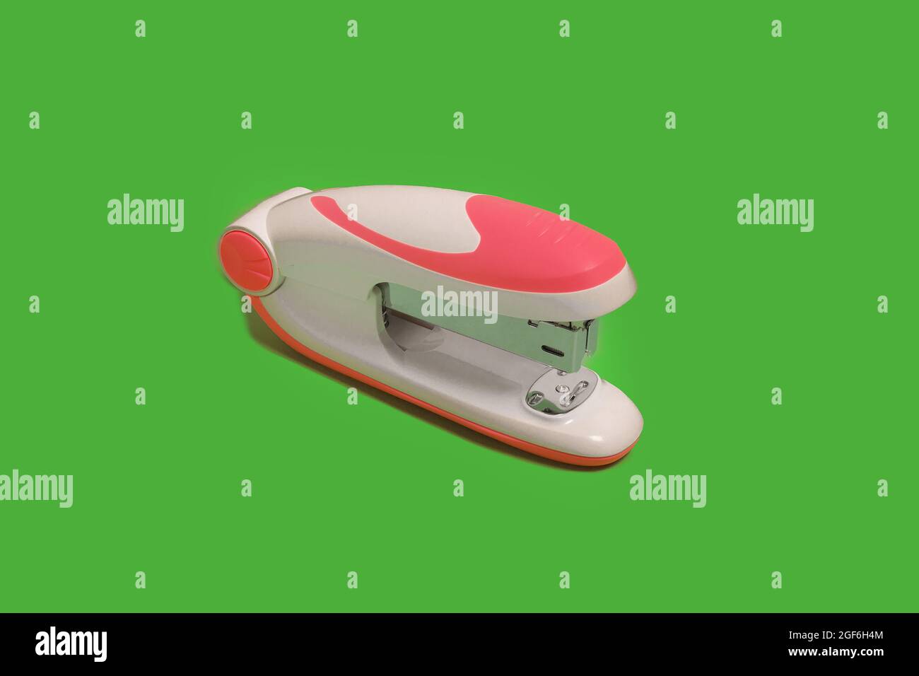 stapler on a green background. school and office accessories Stock ...