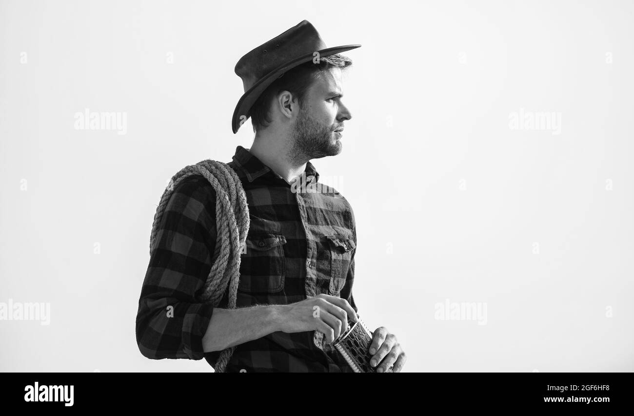 Rustic style. Hero of western culture. Farmer drink water metal flask ...