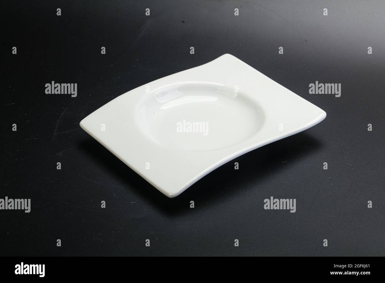 Small plate for catering serving kitchenware Stock Photo - Alamy