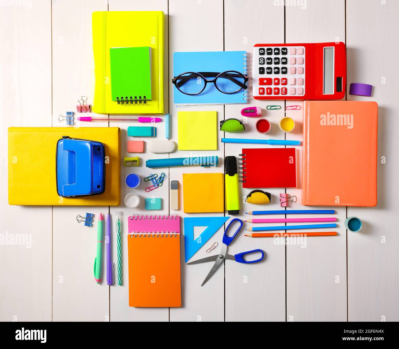Flat lay of stationery on white wooden table background Stock Photo - Alamy