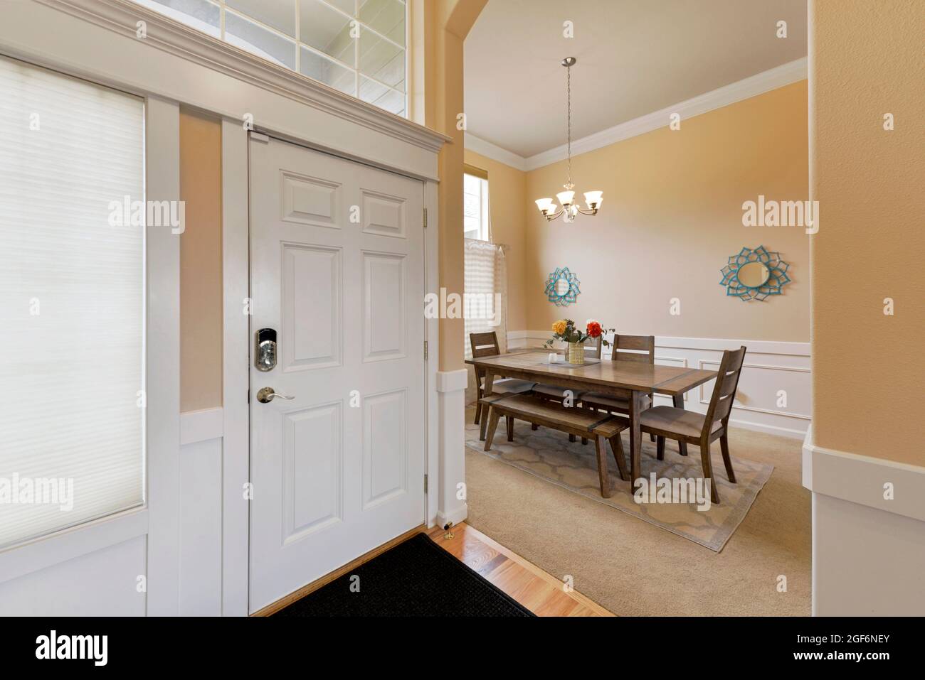 Modern residential entrance and dining room interior Stock Photo - Alamy