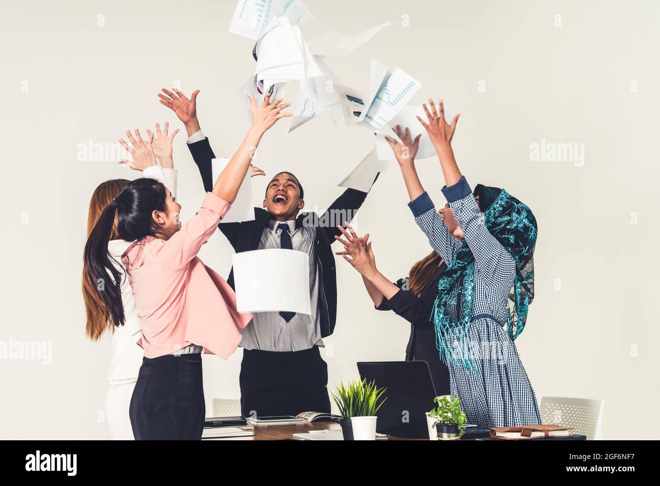 Throwing papers in the air hi-res stock photography and images - Alamy