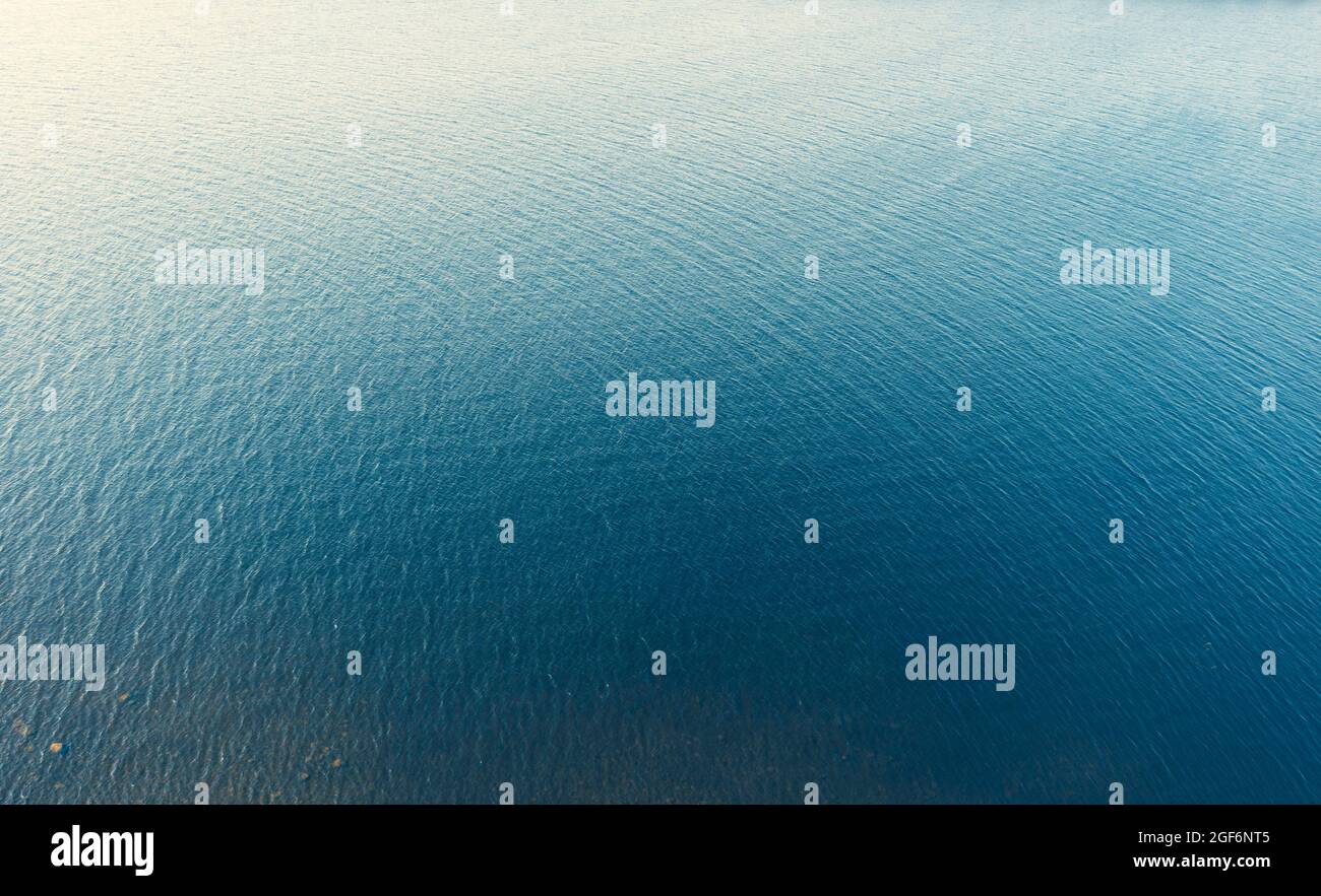Aerial view of a crystal clear sea water texture. Top view from above ...