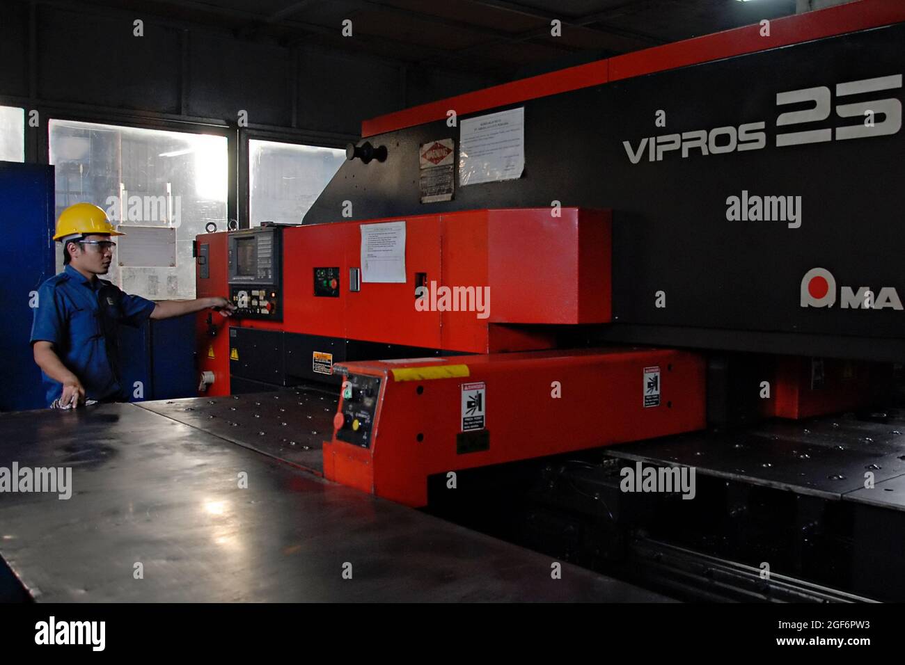 Bogor, West Java, Indonesia - December 2020 : A factory worker works ...