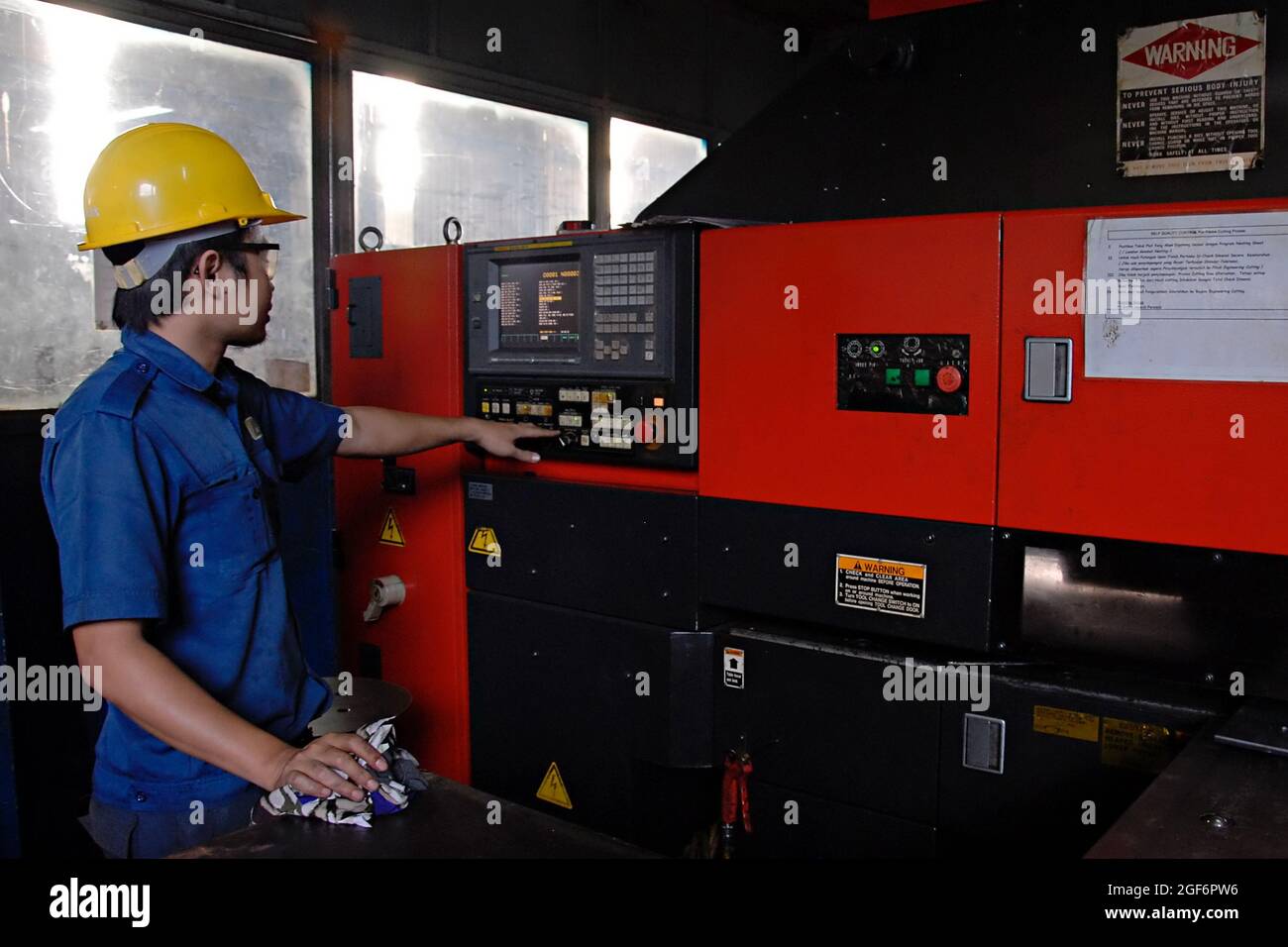 Bogor, West Java, Indonesia - December 2020 : A factory worker works ...