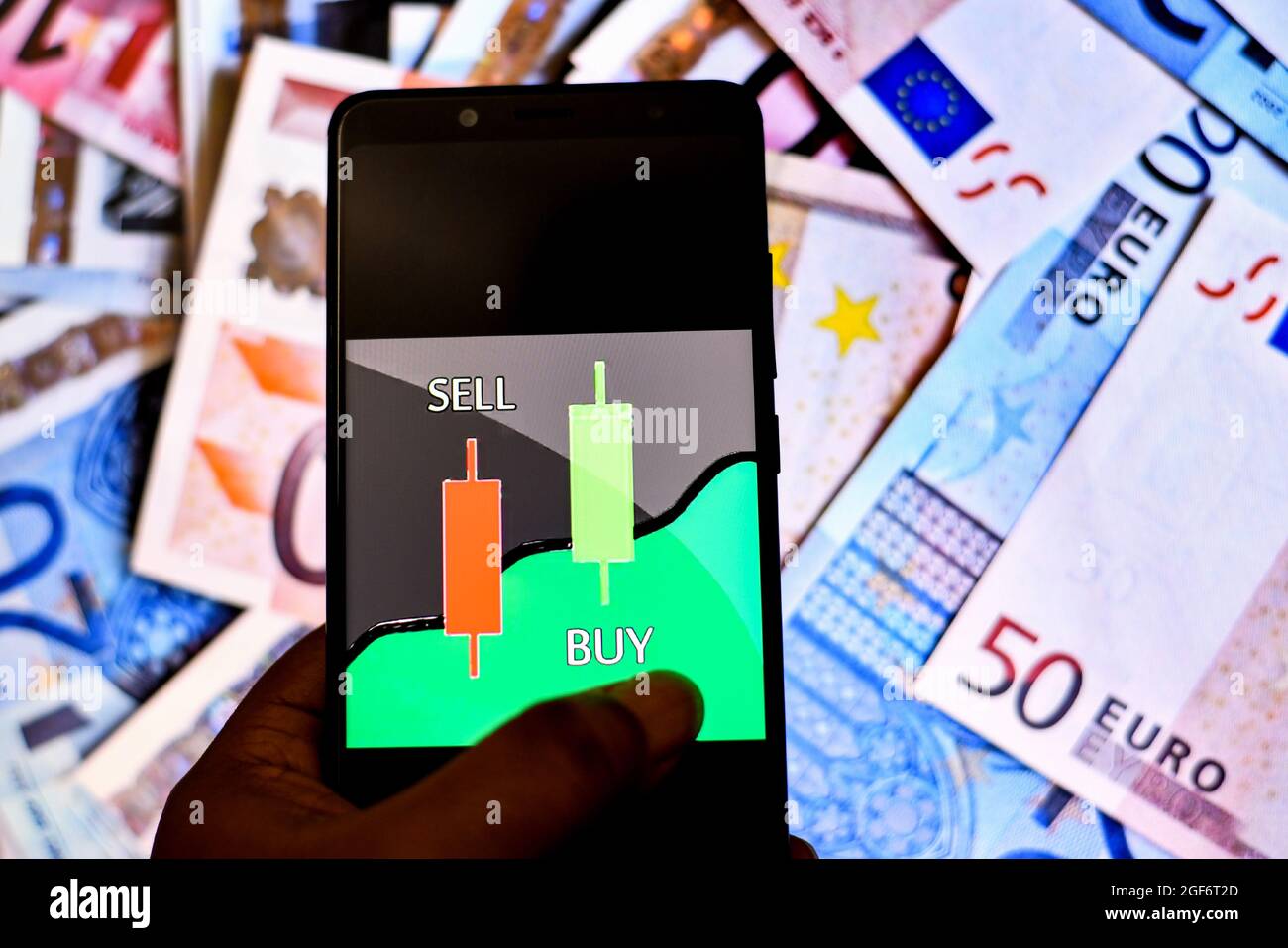 India. 22nd Aug, 2021. In this photo illustration a Buy Sell Candle of ...